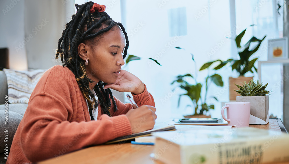 Studying, student and black woman writing in notebook for education ...