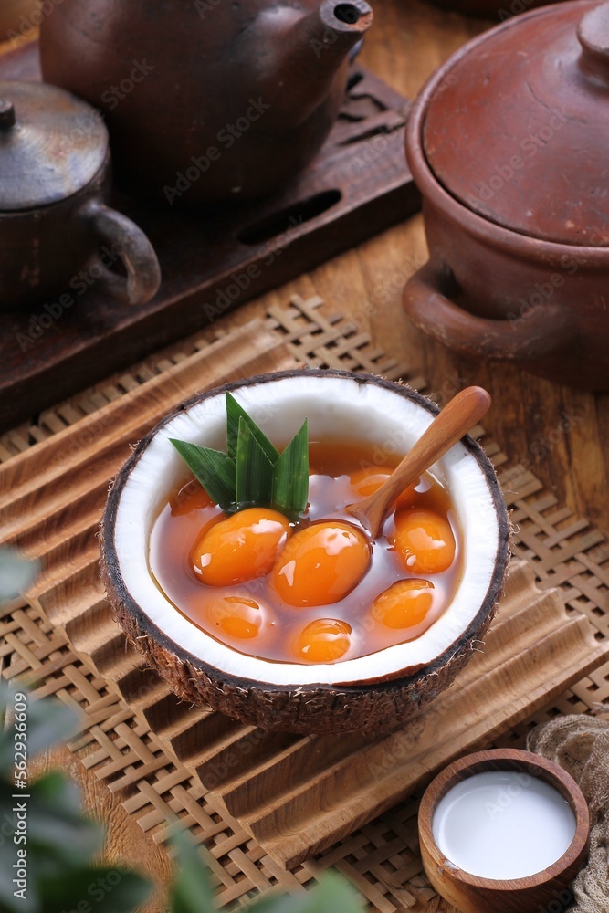 Kolak (or kolek) is a typical Indonesian dessert made from palm sugar ...