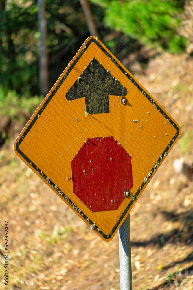 Aged orange or yellow sign that lets drivers know that they are ...