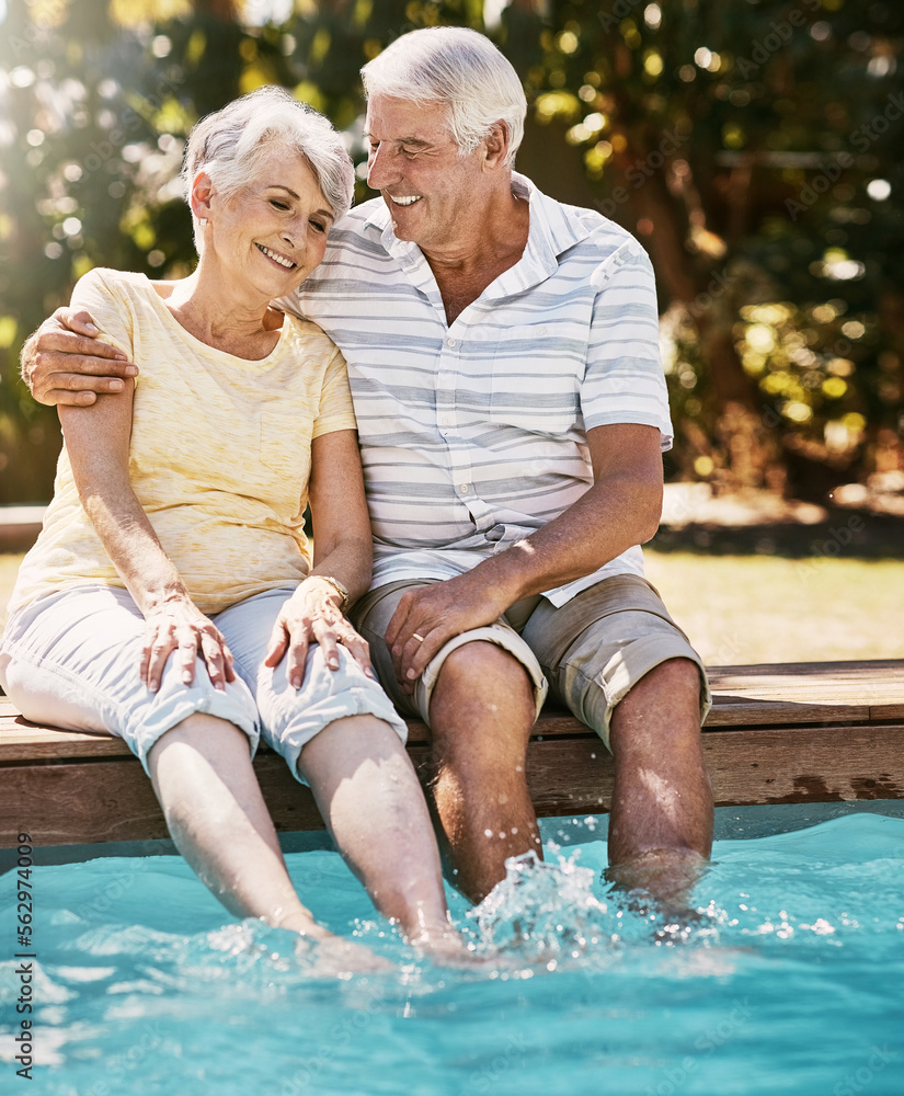 Elderly couple, hug and smile by swimming pool for relax, love or ...