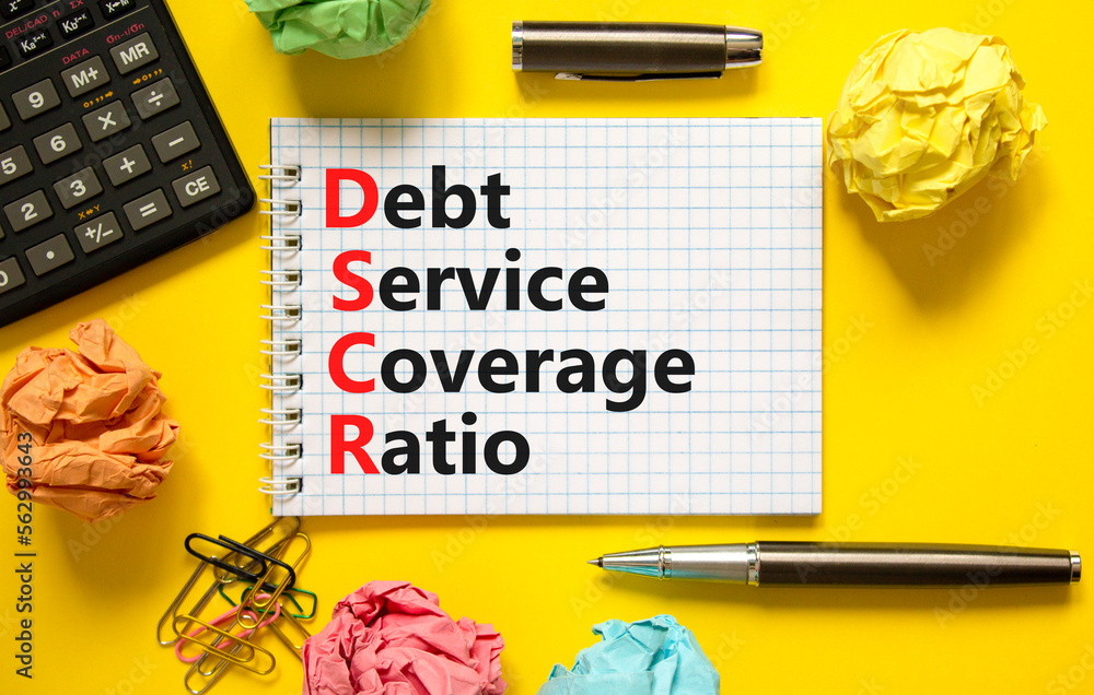 DSCR debt service coverage ratio symbol. Concept words DSCR debt ...