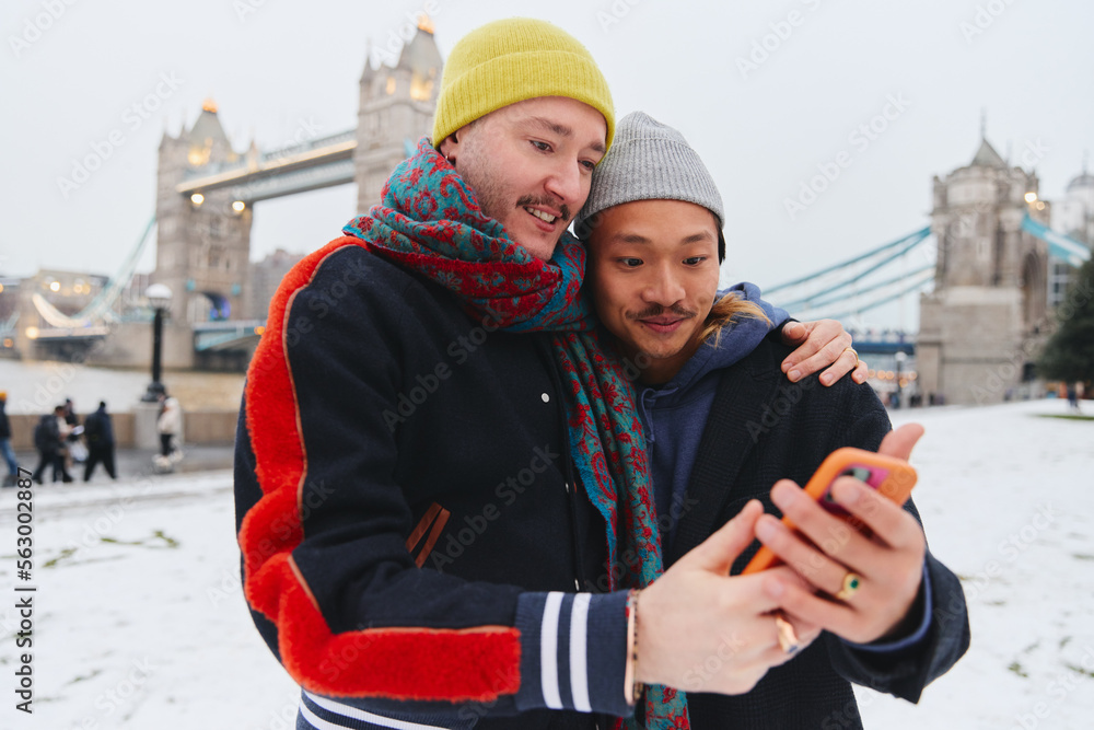 Young Smiling Asian And Caucasian Same Sex Interracial Couple Smiling