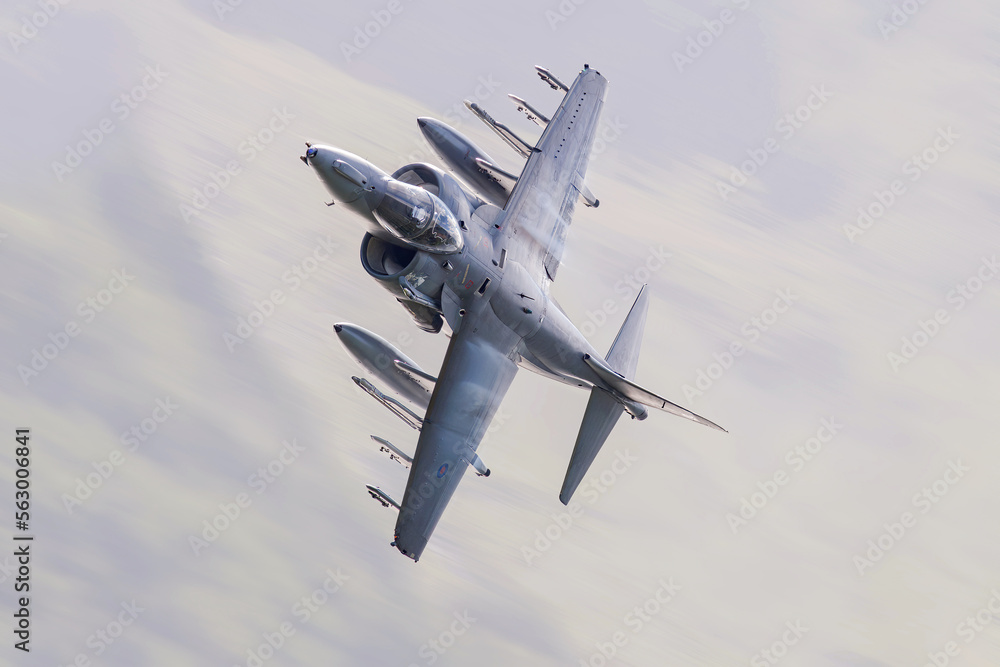 Fighter Jet dramatic view flying low level combat mission in the united ...