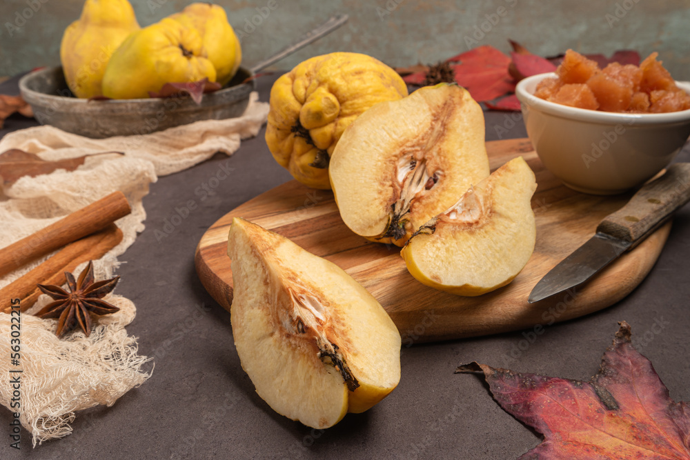 Quince fruit and bowl with quince cheese or marmelada is a sweet, thick ...
