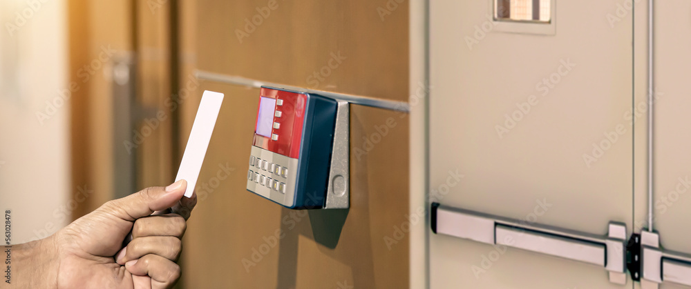 Proximity card reader door unlock, Hand security man using ID card on ...