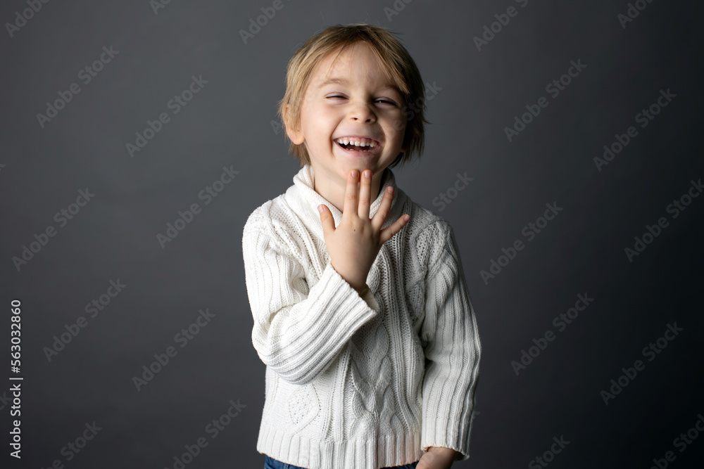 Cute little toddler boy, showing THANK YOU gesture in sign language on ...