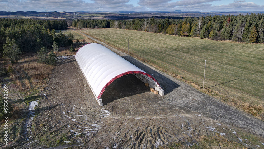 Aerial view of the construction of a fabric dome building. Fabric ...