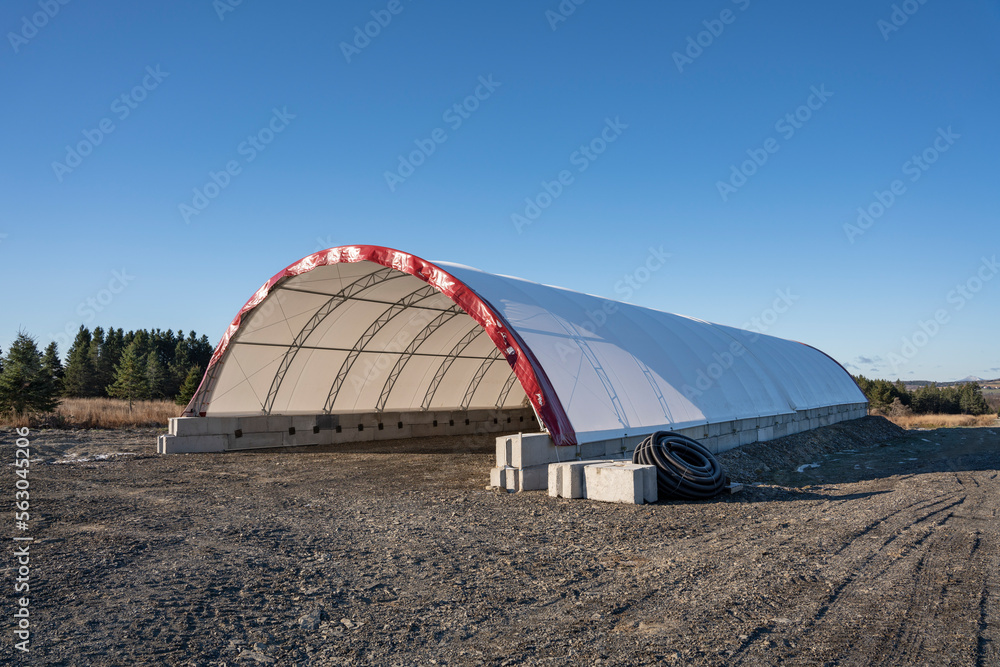 Constuction of a commercial fabric dome. Hoop building. Canvas. Fabric ...