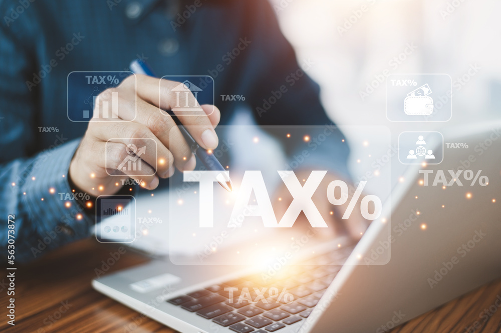 Accountant calculating income tax concept. Tax deduction planning and ...