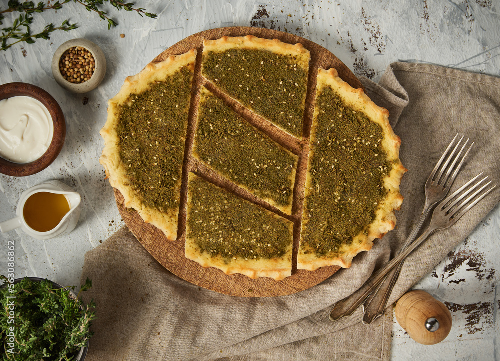thyme & sesame topped manousha lebanese food - overhead view Stock ...