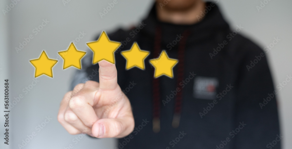 Hand holding light bulb with power plug and show trees, renewable ...