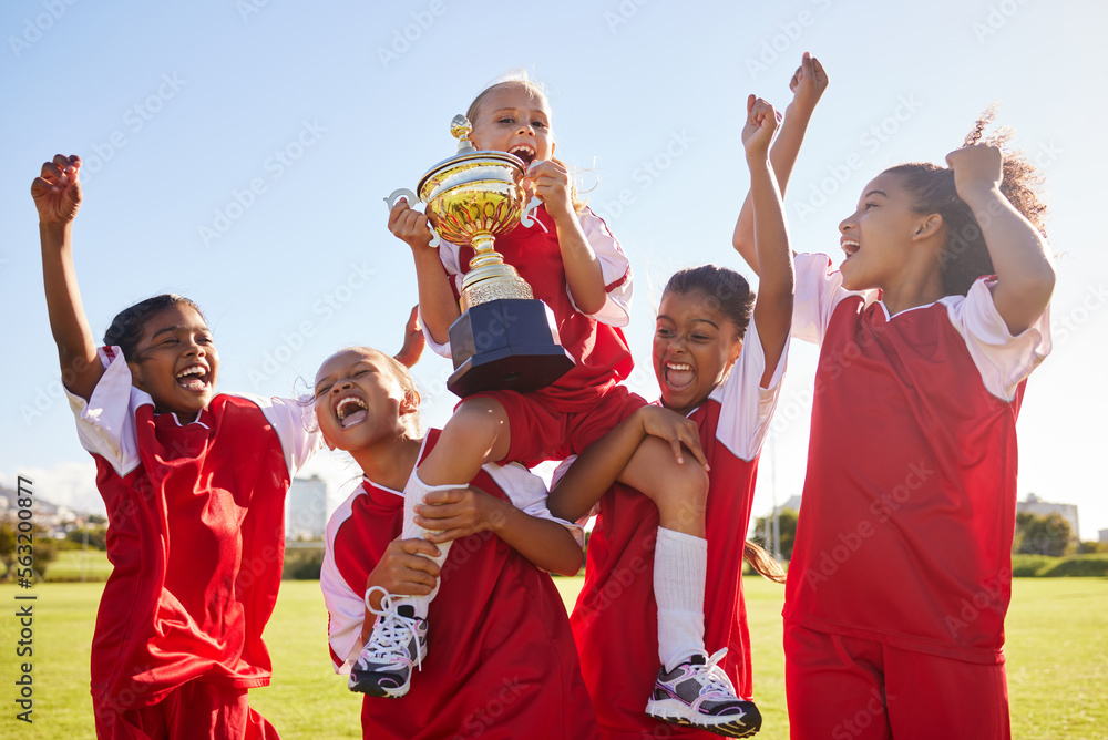 Soccer, team and trophy with children in celebration together as a girl winner group for a ...
