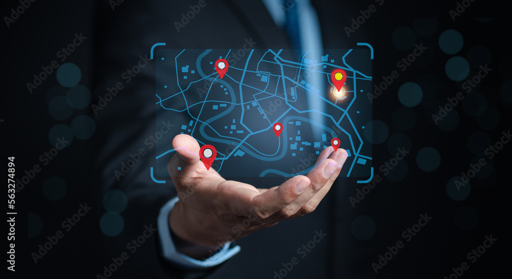 Businessman searching world map with location point, GPS app ...