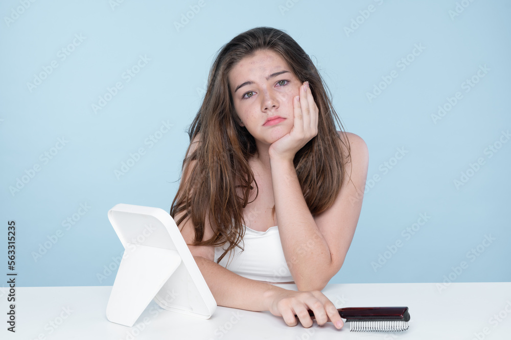 Beautiful girl feel sad, worry about her damaged hair with isolated ...