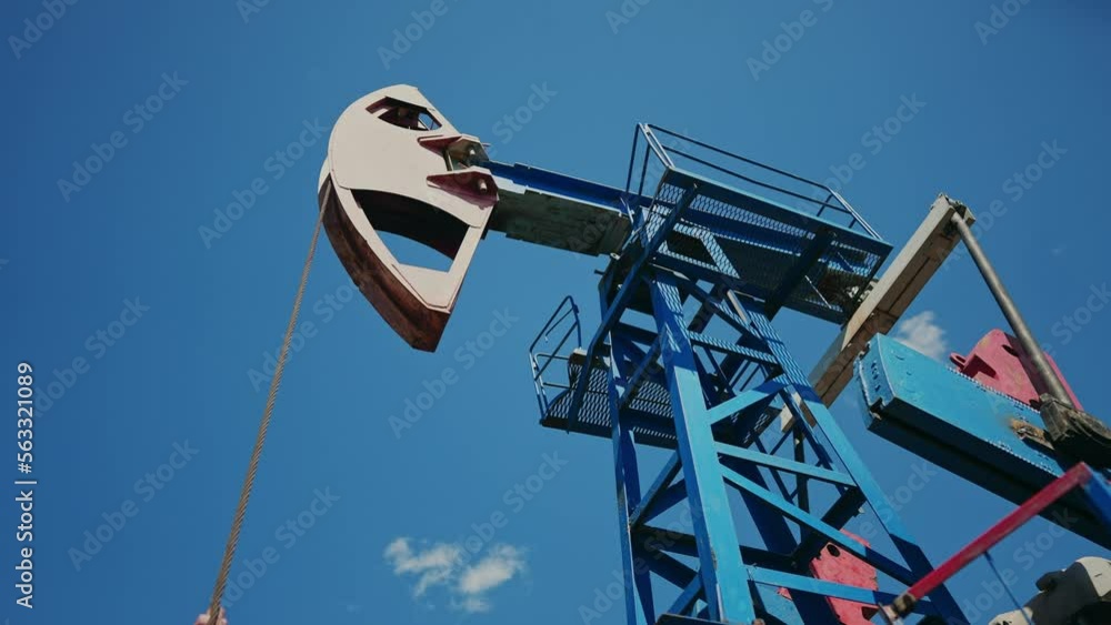 oil business. oil pump pumps out of the ground resource extraction ...