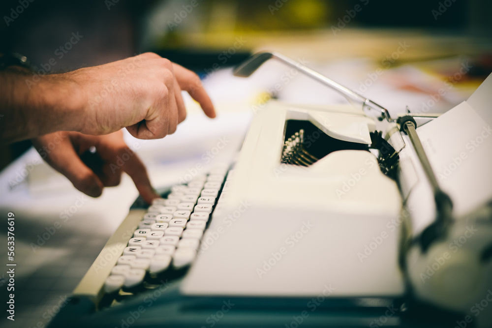 Typing a document using fingertips on an analog typewriter Stock Photo ...