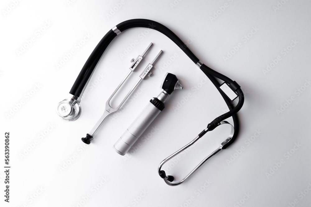 tuning fork C 128 on a white background with gradation, otorhinoscope ...