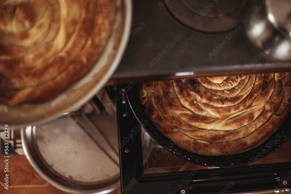 Roll pastry cooked in a wood stove. Title: on a white background ...