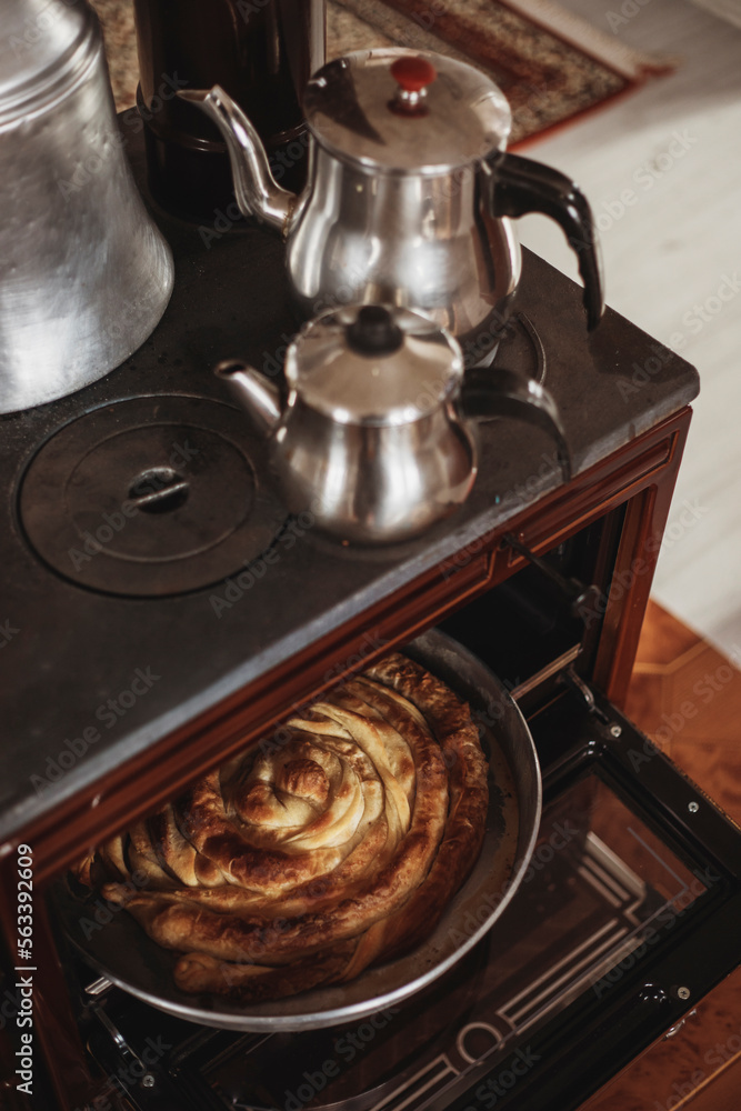 Roll pastry cooked in a wood stove. Title: on a white background ...