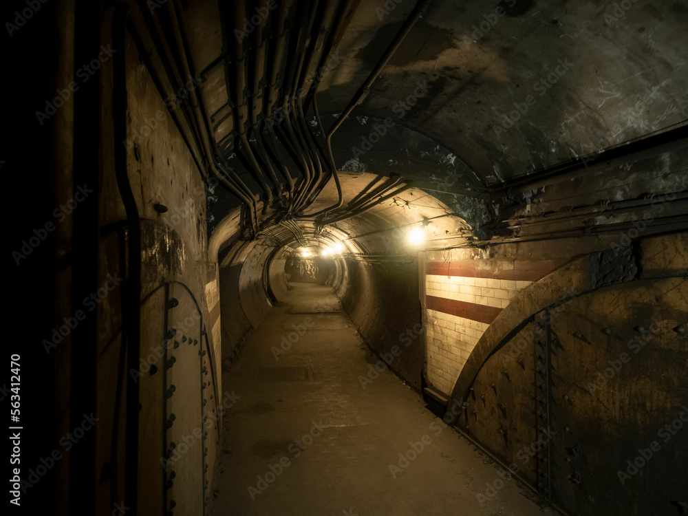 Eerie, deserted, underground, dark, subway tube tunnel, London, UK ...