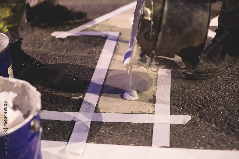 Process of making new road surface markings with line striping machine ...