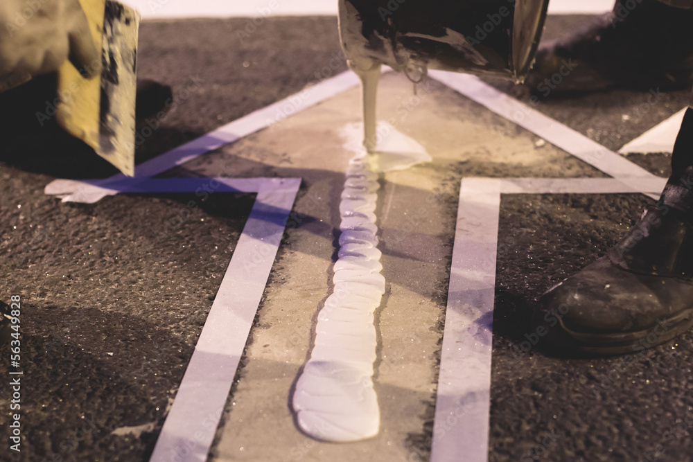 Process of making new road surface markings with line striping machine ...