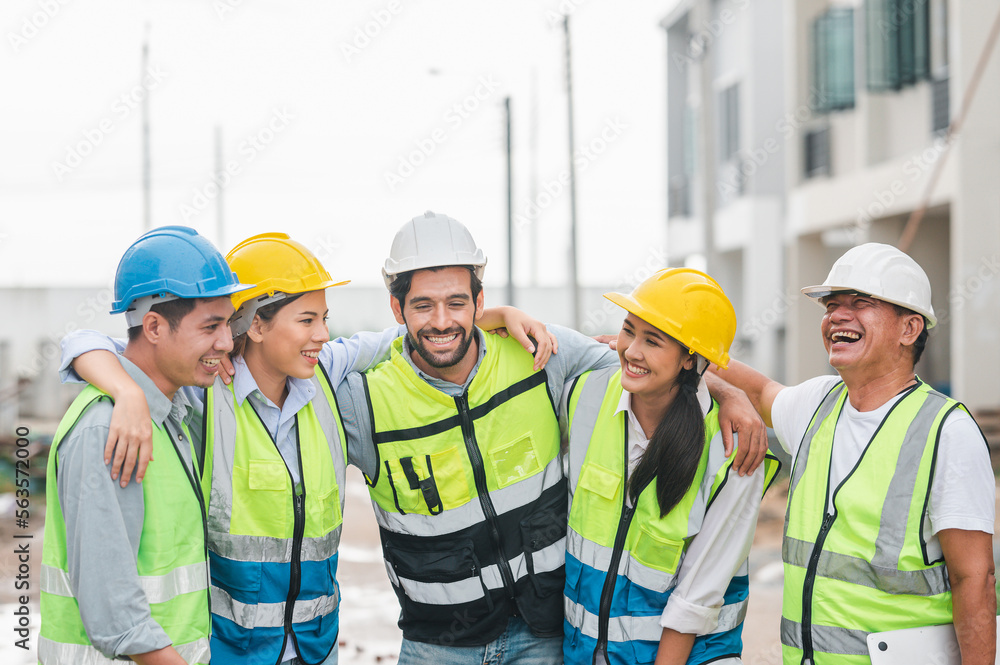 Group of happy construction team with architect engineer laughing ...