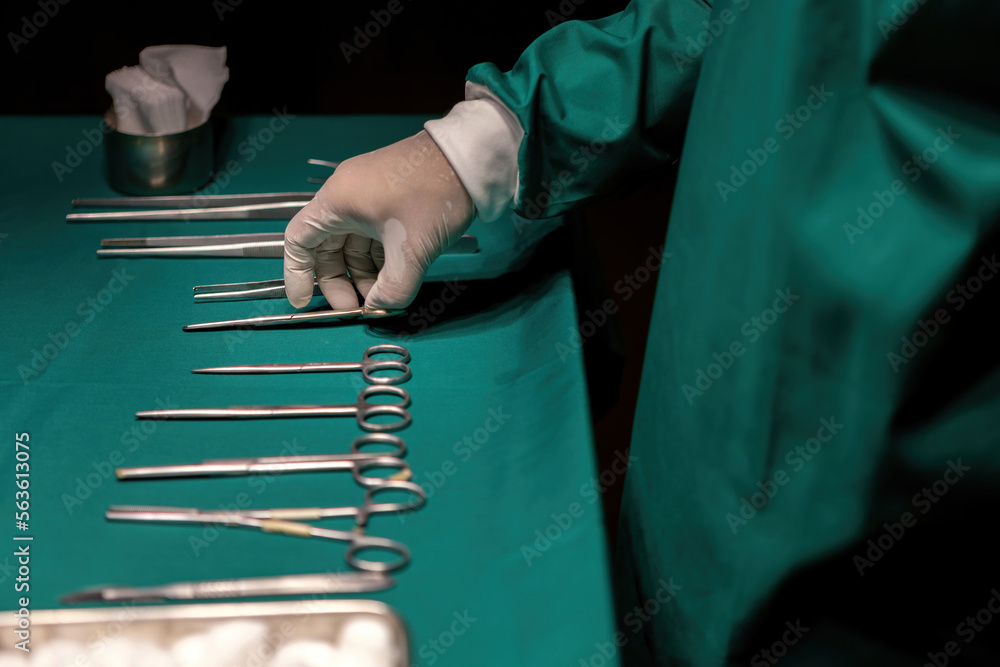 doctor preparing medical instruments operating surgery in emergency ...
