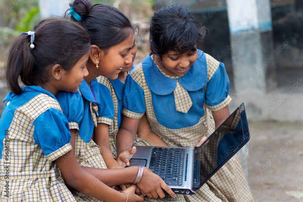 indian village government school girls operating laptop computer system ...