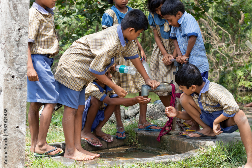 Poster Indian Rural School Students drinking water from Tubewell at ...