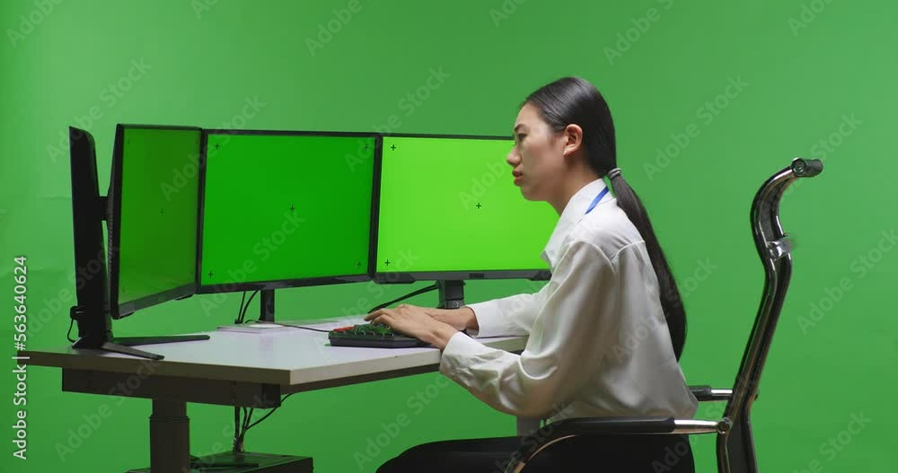 Side View Of Asian Woman Thinking While Working With Mock Up Multiple ...