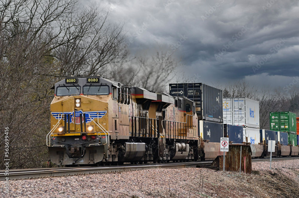 Union Pacific Railroad locomotives lead an intermodal freight train ...