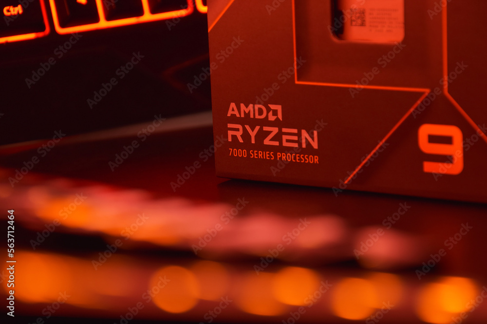 A close-up of an AMD Ryzen 9 3900X processor in a packaging box with ...