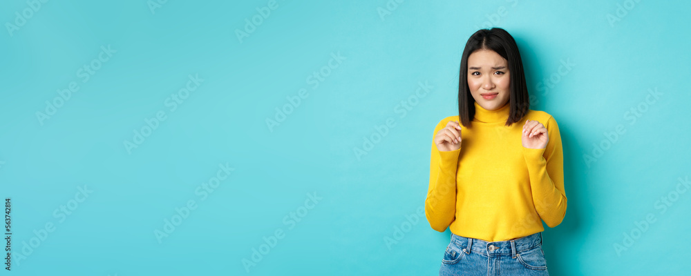 Image of disgusted chinese woman looking with cringe and aversion ...