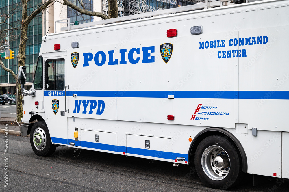 Photo of a NYPD mobile command center white van parked outside the ...
