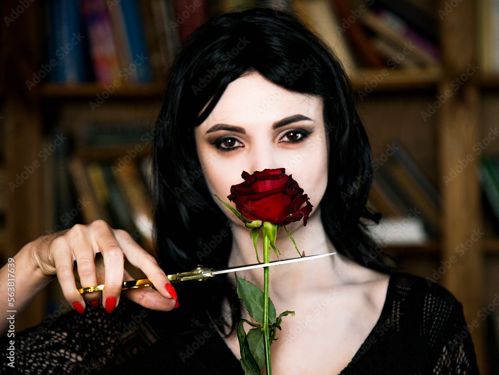 beautiful brunette girl cosplay morticia addams with red lips and nails ...