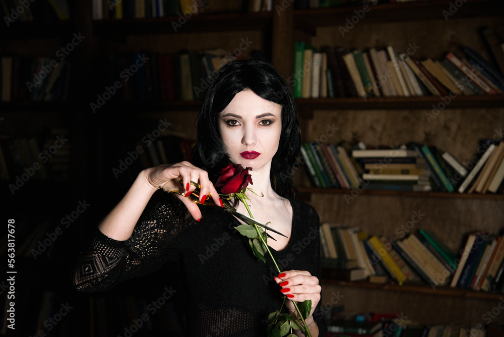 beautiful brunette girl cosplay morticia addams with red lips and nails ...