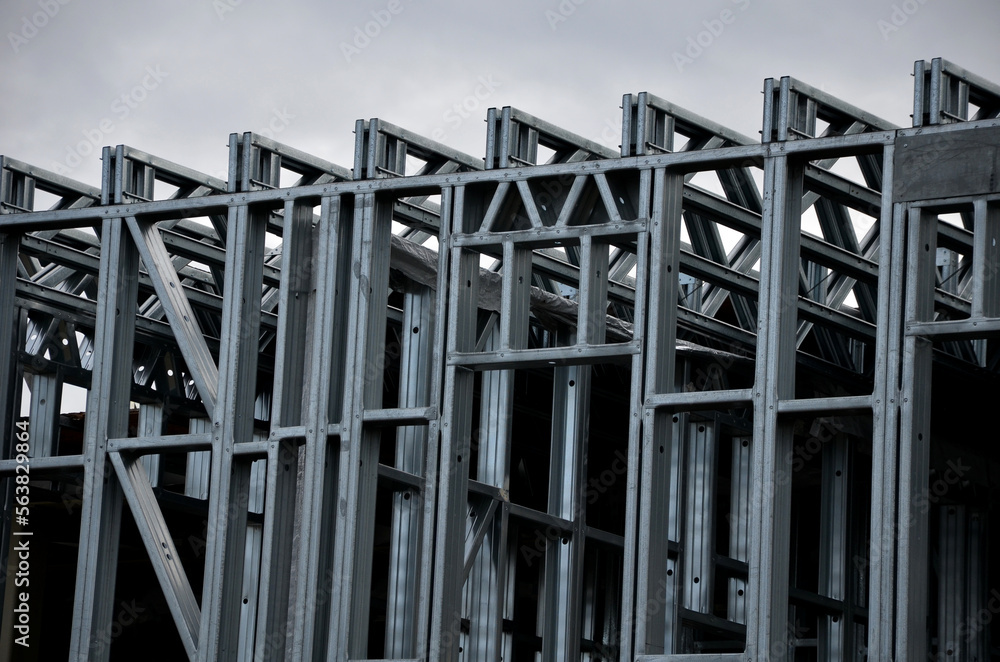 Building construction from metal trusses. lattice structure of the ...