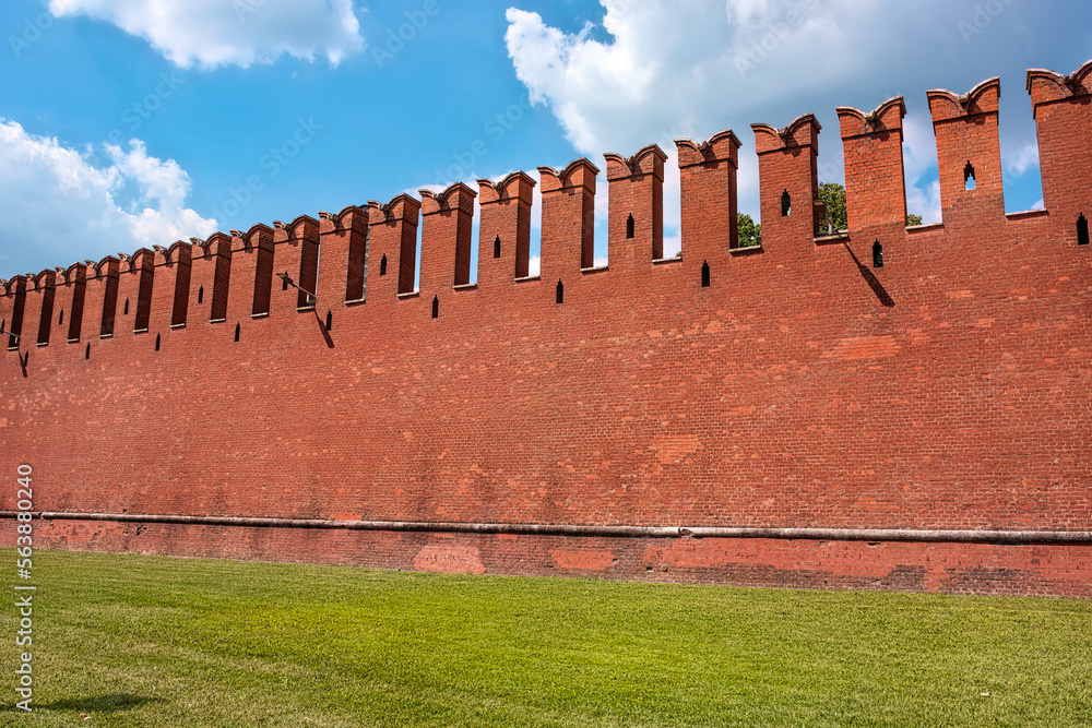 The famous Kremlin wall with dovetail crenellations. The texture of the ...