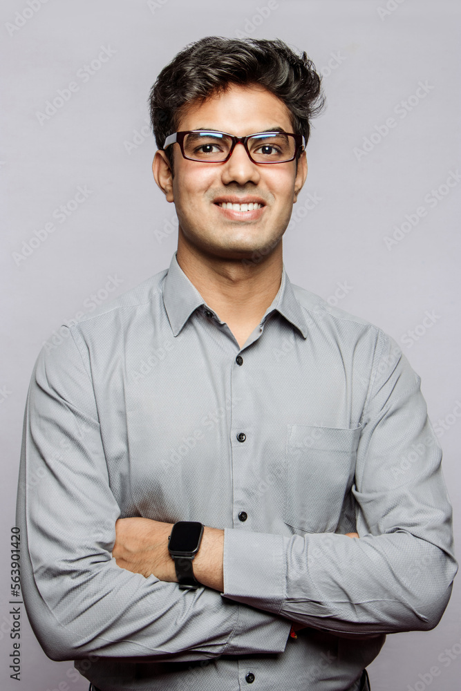 Young Sophisticated Indian handsome adult wearing a shirt and glasses ...