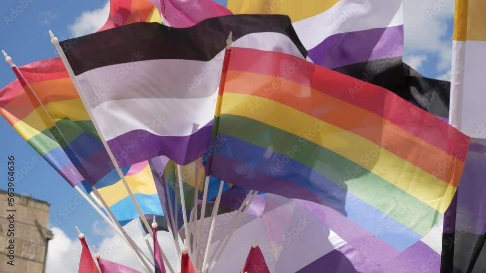 Small rainbow pride flags, symbols of LGBT lesbian, gay, bisexual, and ...