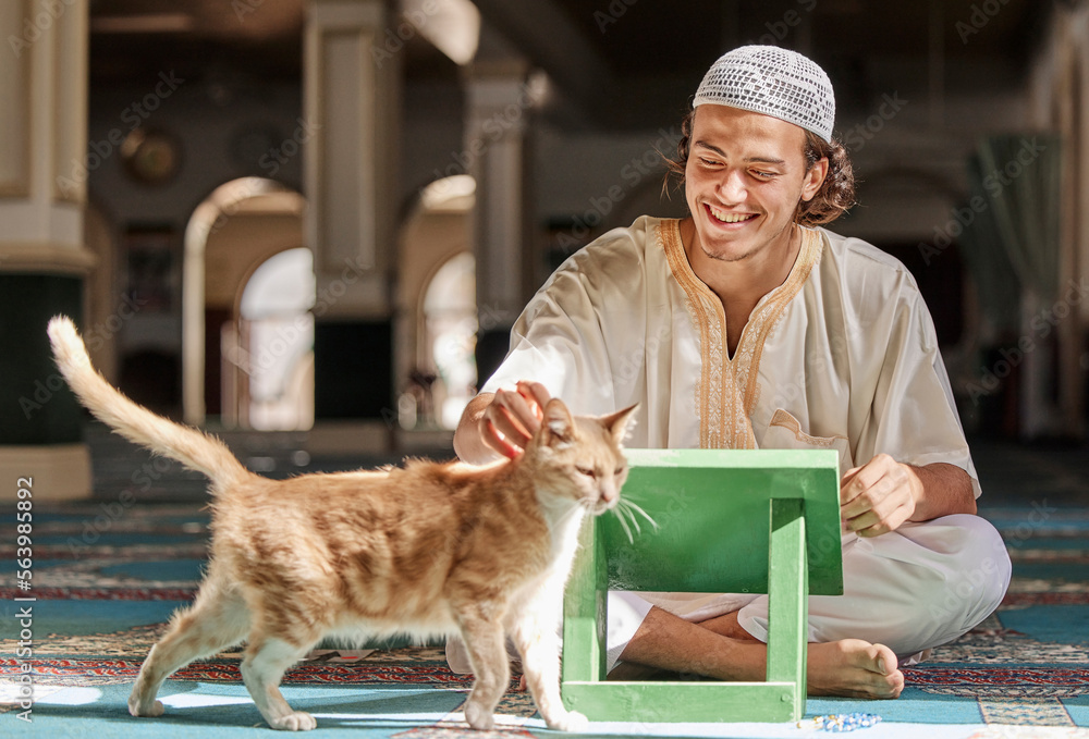 Foto de Muslim, man and cat in a mosque, happy and smile during ...