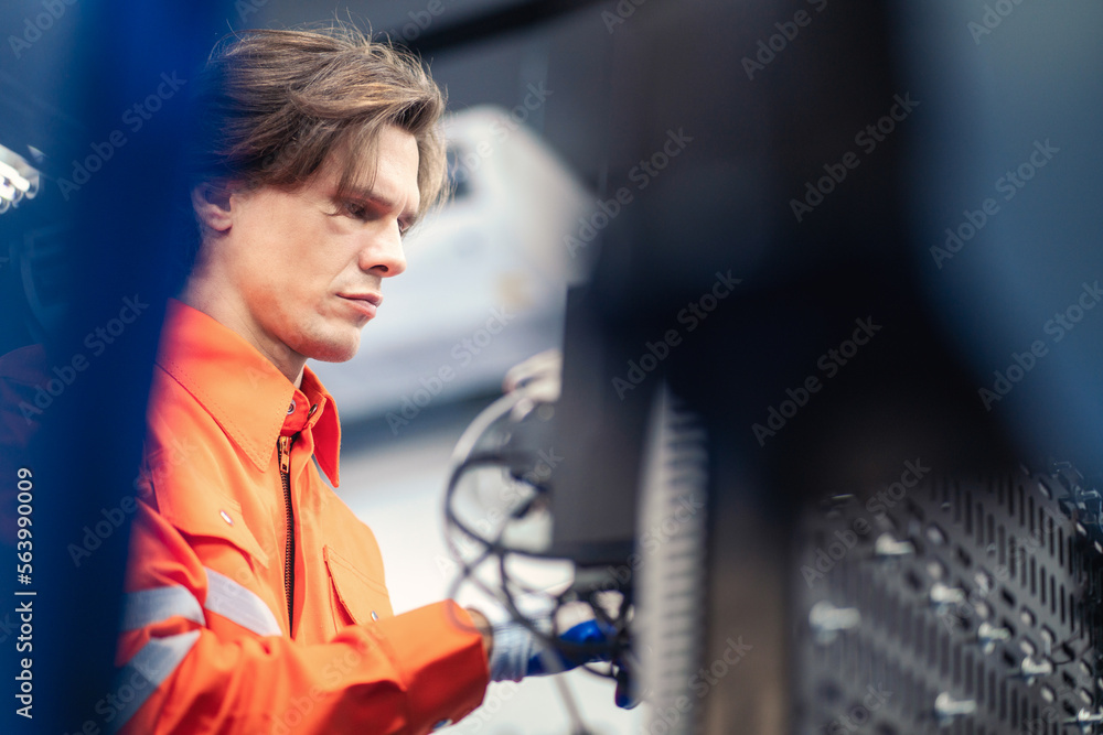 Electrical engineer checking Power Distribution Cabinet in the control ...