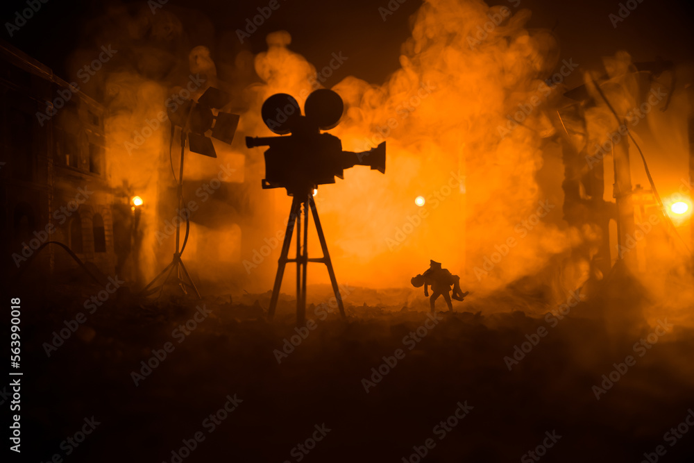 Action (War) movie concept. Man moving out with little boy from burned ...