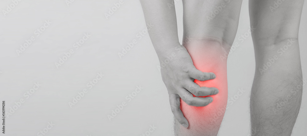 Male hand holding calf pain area. concept of health care. inflammatory ...