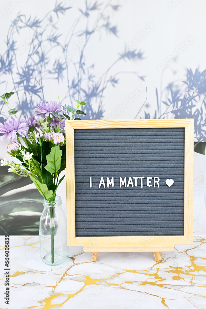 Grey letter board with phrase I am matter, self love, self care ...