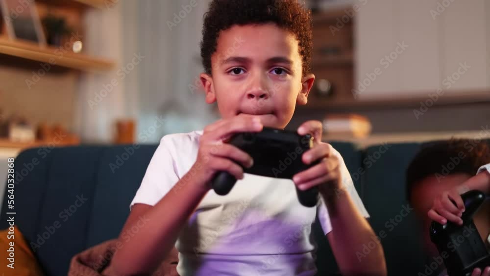 Vidéo Stock Excited cute little boy kid with joystick controller ...