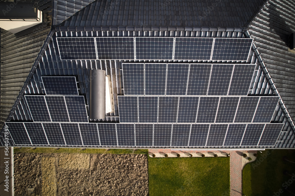 Residential house with solar photovoltaic panel system on rooftop ...