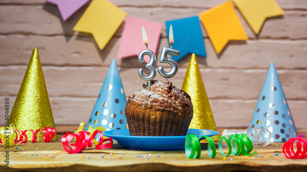 Festive cake with a candle with a number 35. Happy birthday background ...