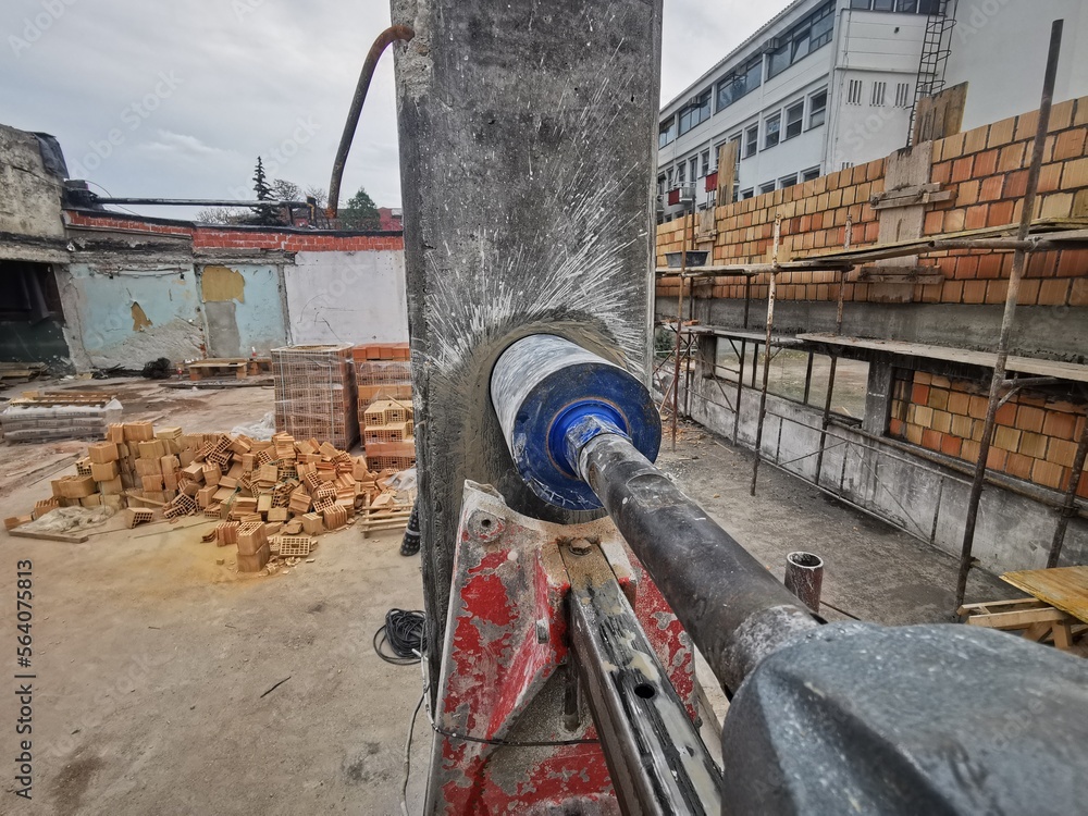Hole cutting machine. Drilling concrete with an industrial drilling ...